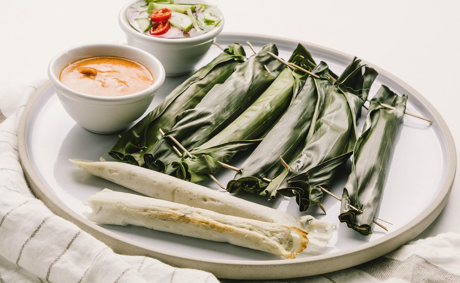 Grilled Fish Cake in Banana Leaves with Red Curry Sauce (งบปลาถอดร่าง)