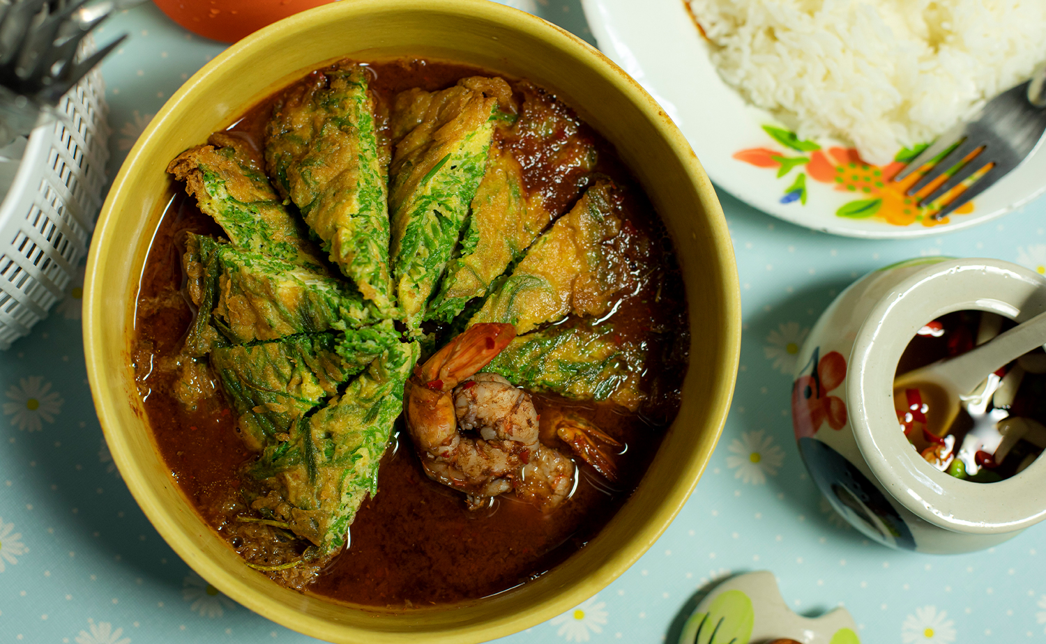 Climbing Wattle Omelette and Lotus Stalk in Sour Soup (แกงส้มสายบัวไข่ชะอม)
