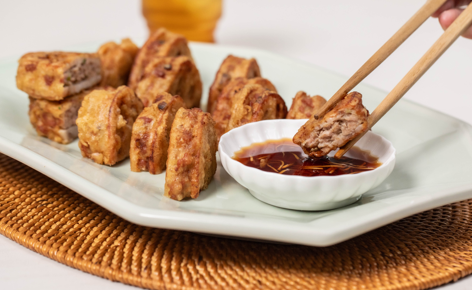Stuffed Lotus Root Fritters with Pork (รากบัวไส้หมูทอด)